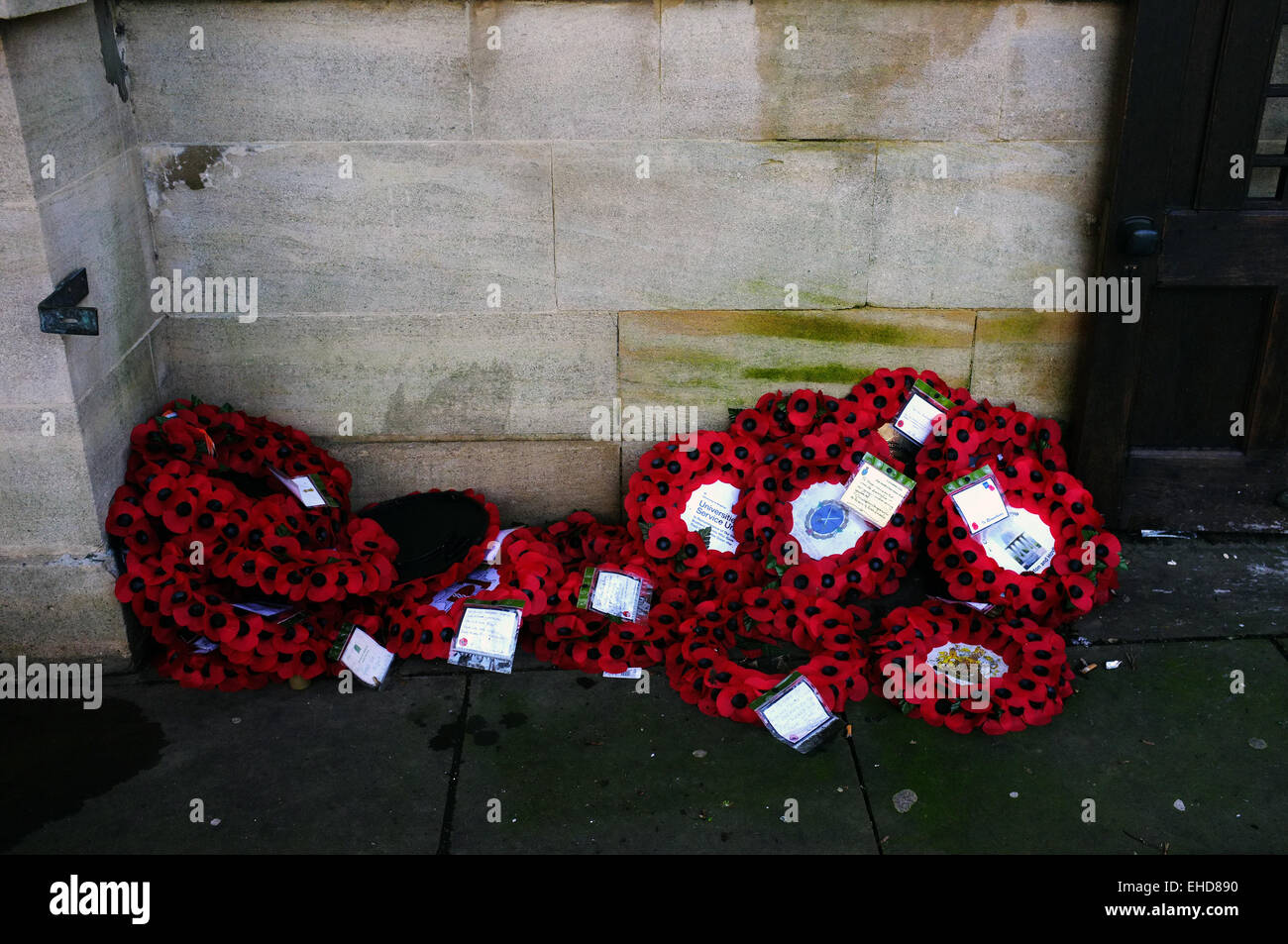 A pile of poppy wreaths laying on the ground in Brighton, UK Stock ...