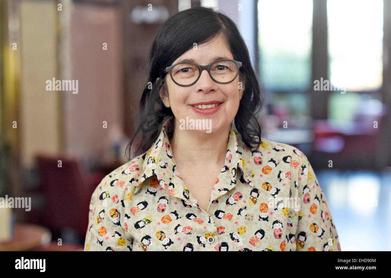 Cologne, Germany. 12th Mar, 2015. Swiss author Katja Alves poses at the ...