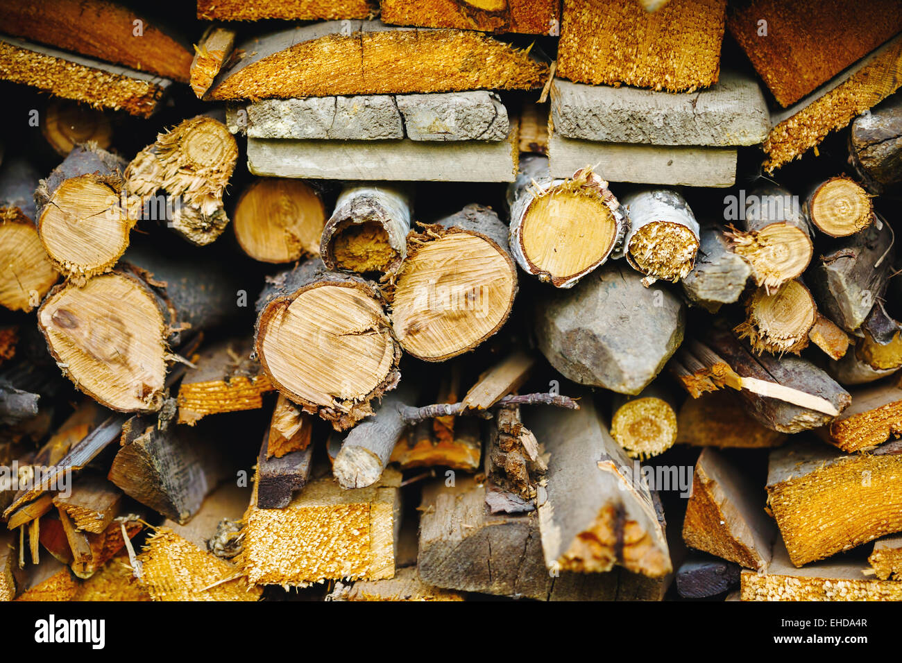 Stack of ready logs. Wood texture background Stock Photo - Alamy
