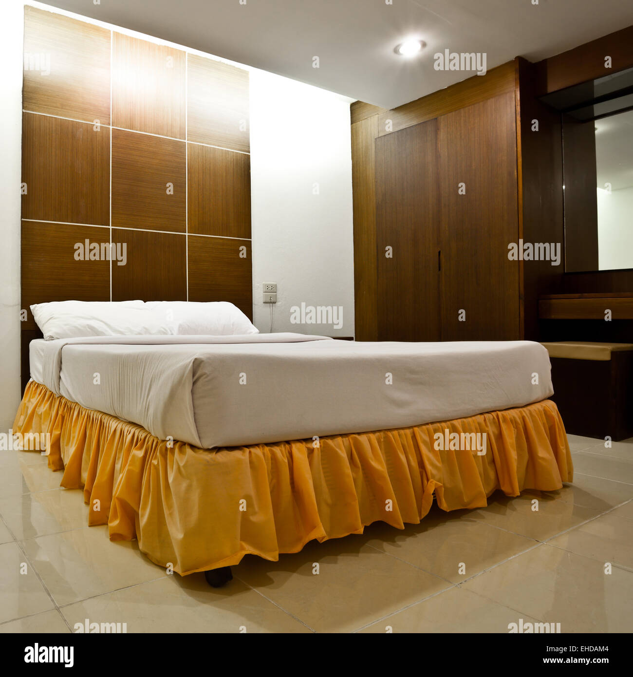 Hotel bedroom interior in evening Stock Photo - Alamy