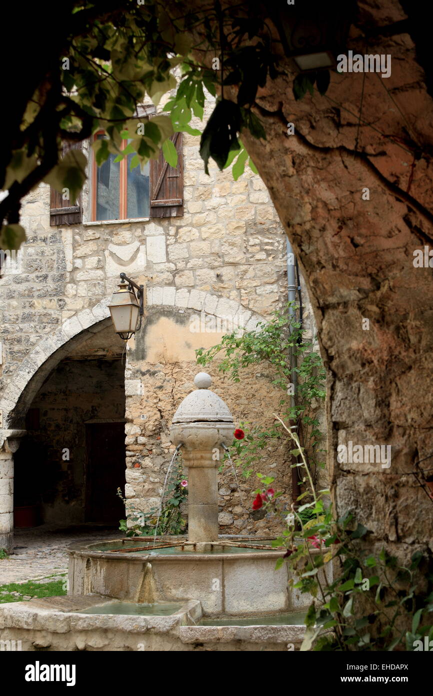 Picturesque Provence square of the medieval perched village of Peille ...