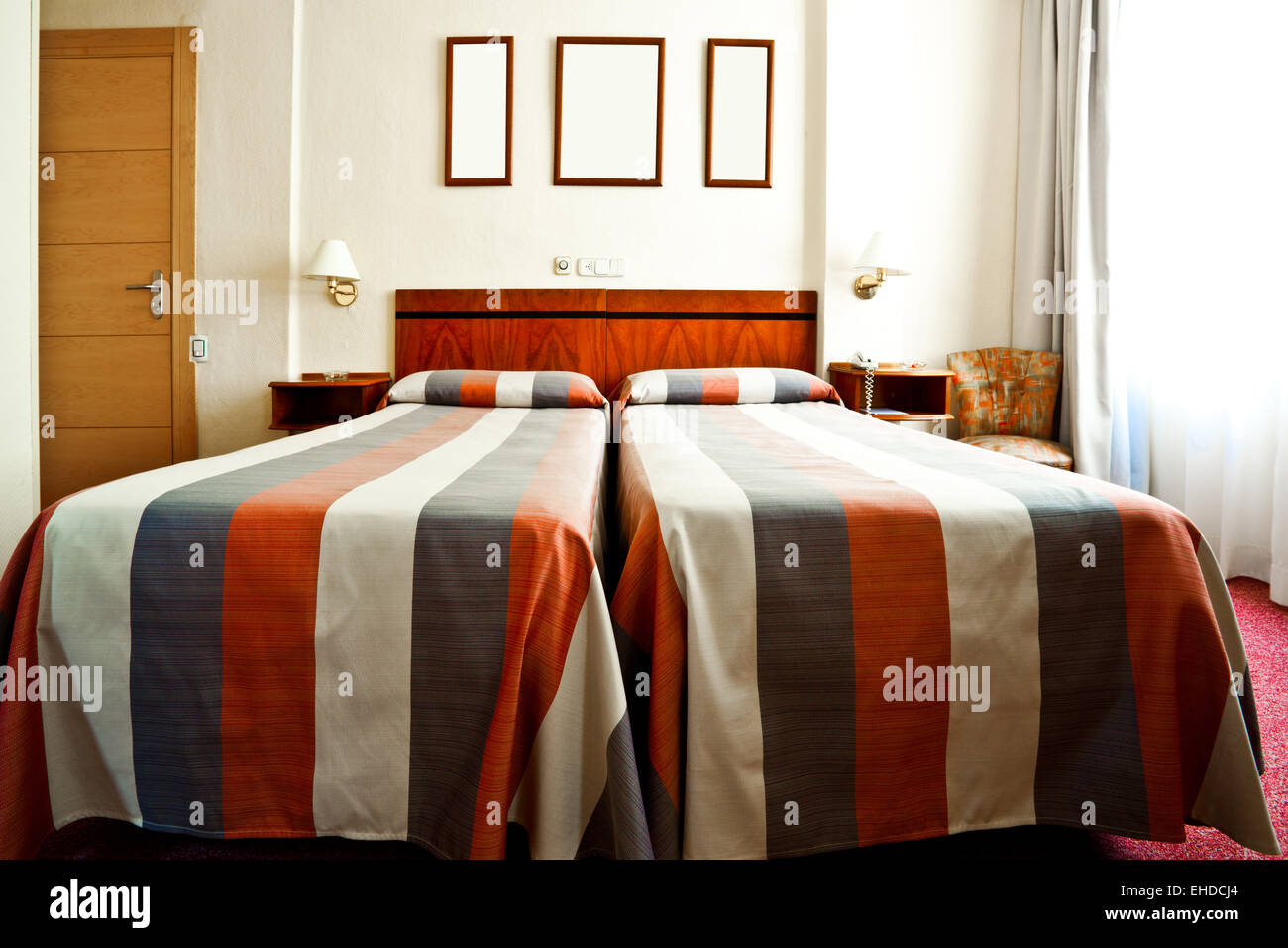Hotel bedroom interior with bads Stock Photo - Alamy