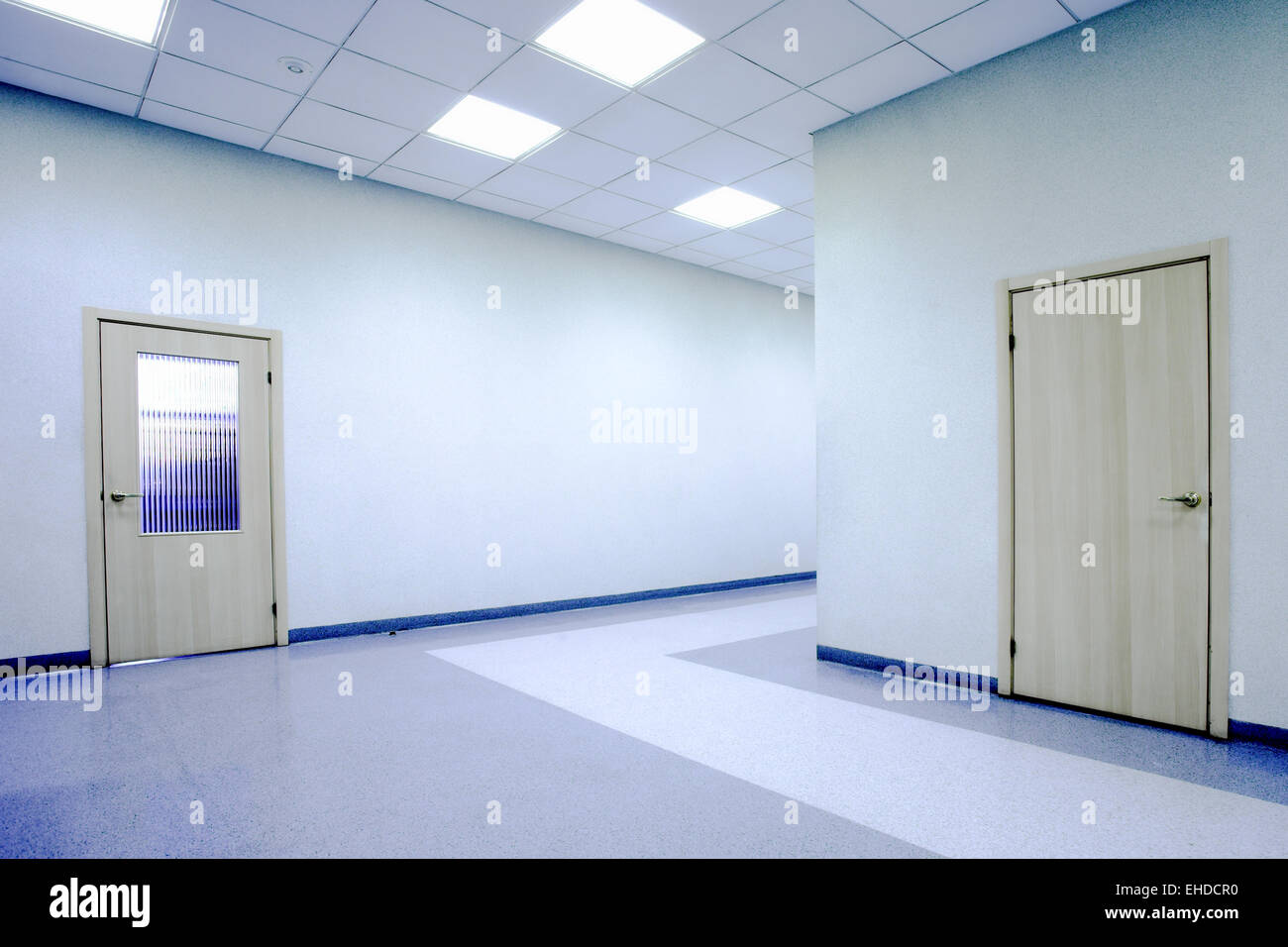 Blue office hall and doors Stock Photo - Alamy
