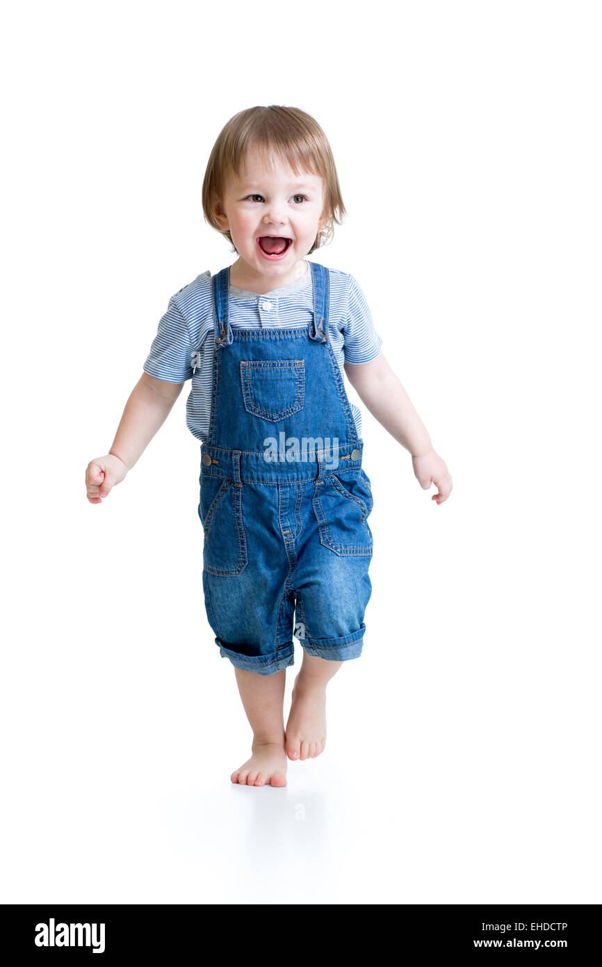 Happy little boy running Stock Photo - Alamy
