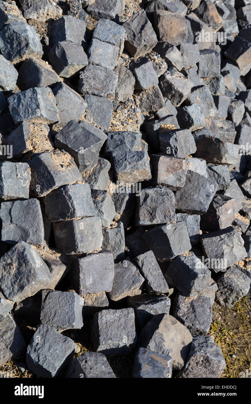 Cobblestone stored at a construction site Stock Photo - Alamy