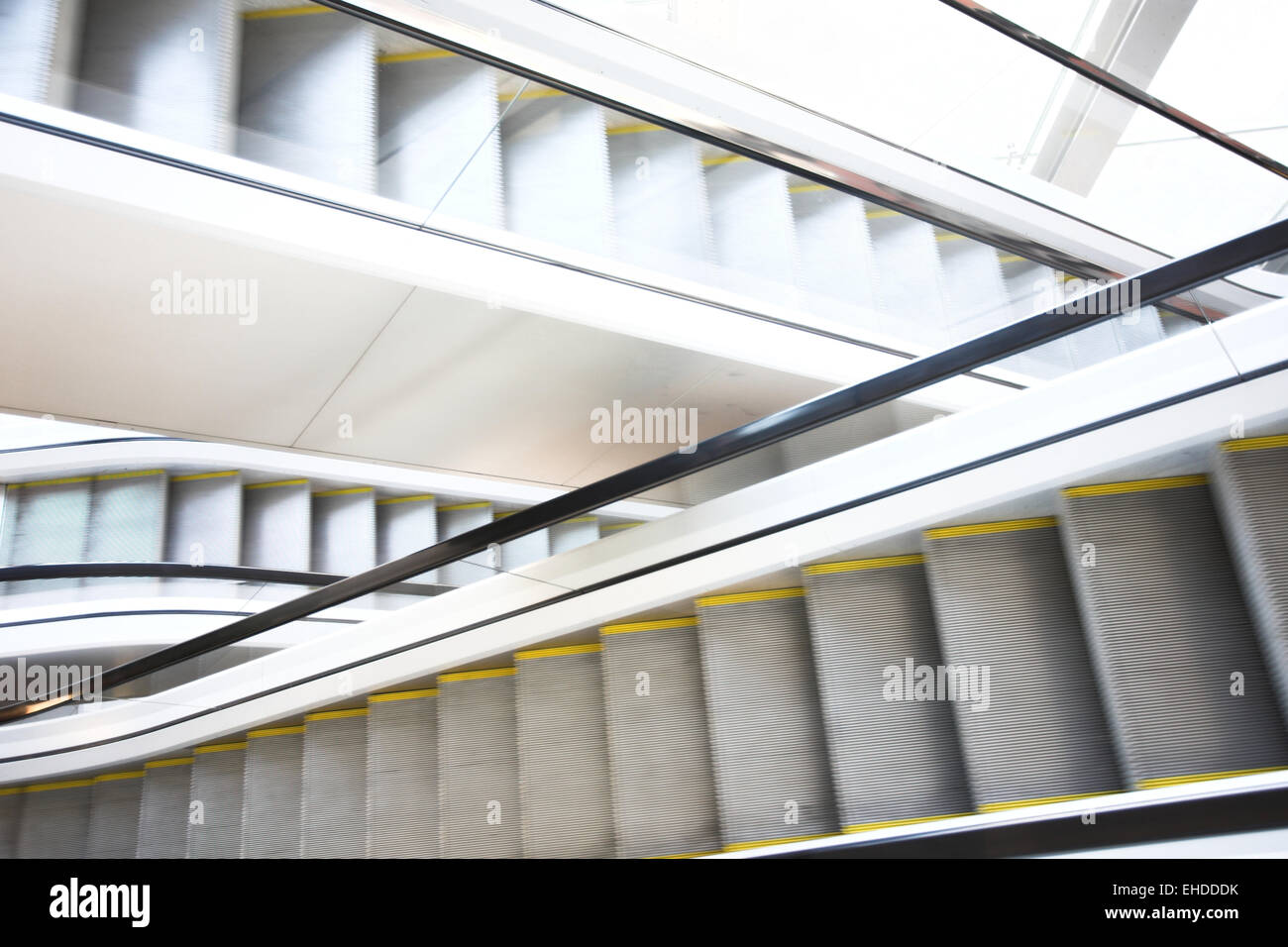 moving escalator in the office hall Stock Photo - Alamy