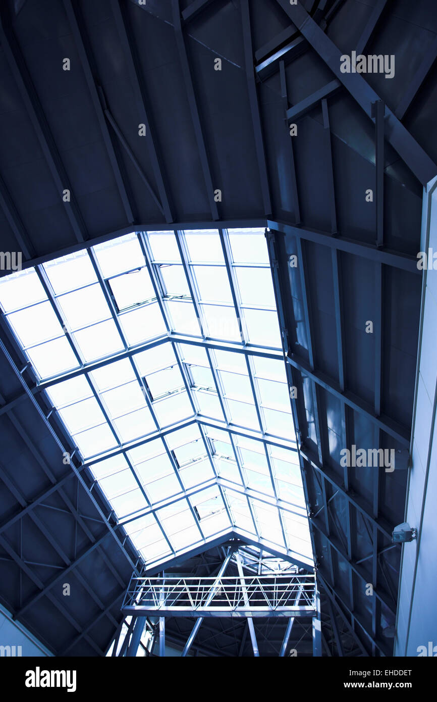 Blue ceiling inside modern office Stock Photo - Alamy