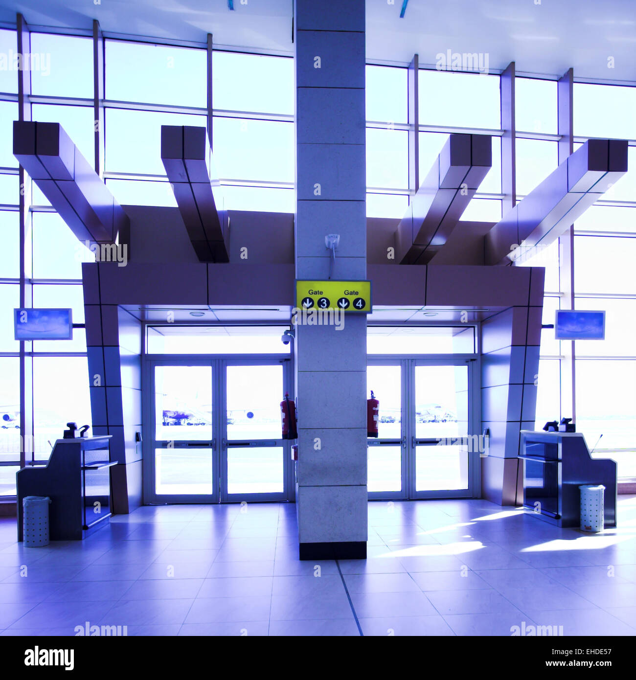Violet gate in airport terminal Stock Photo - Alamy