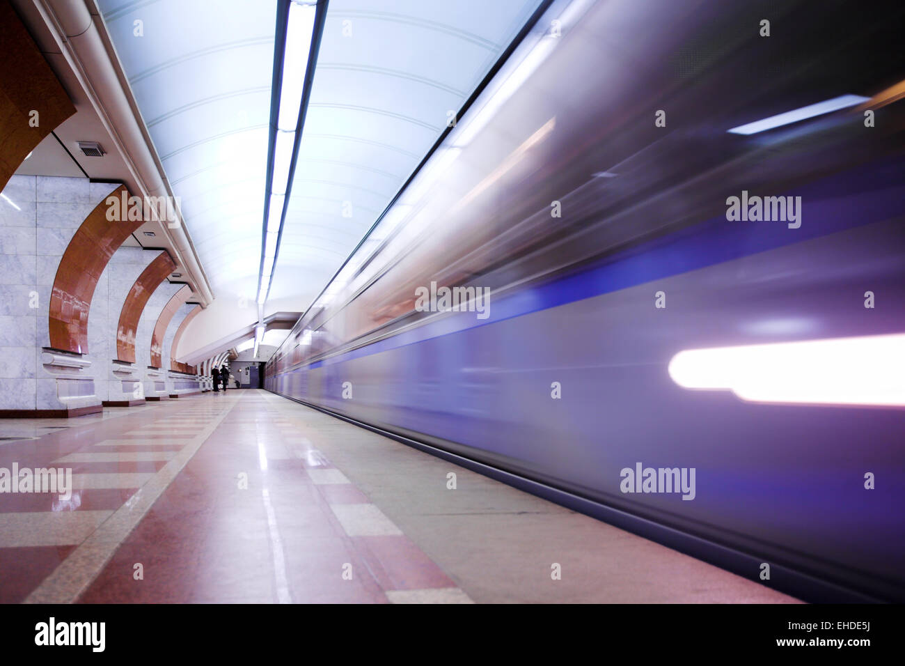 Moving train on underground station Stock Photo - Alamy