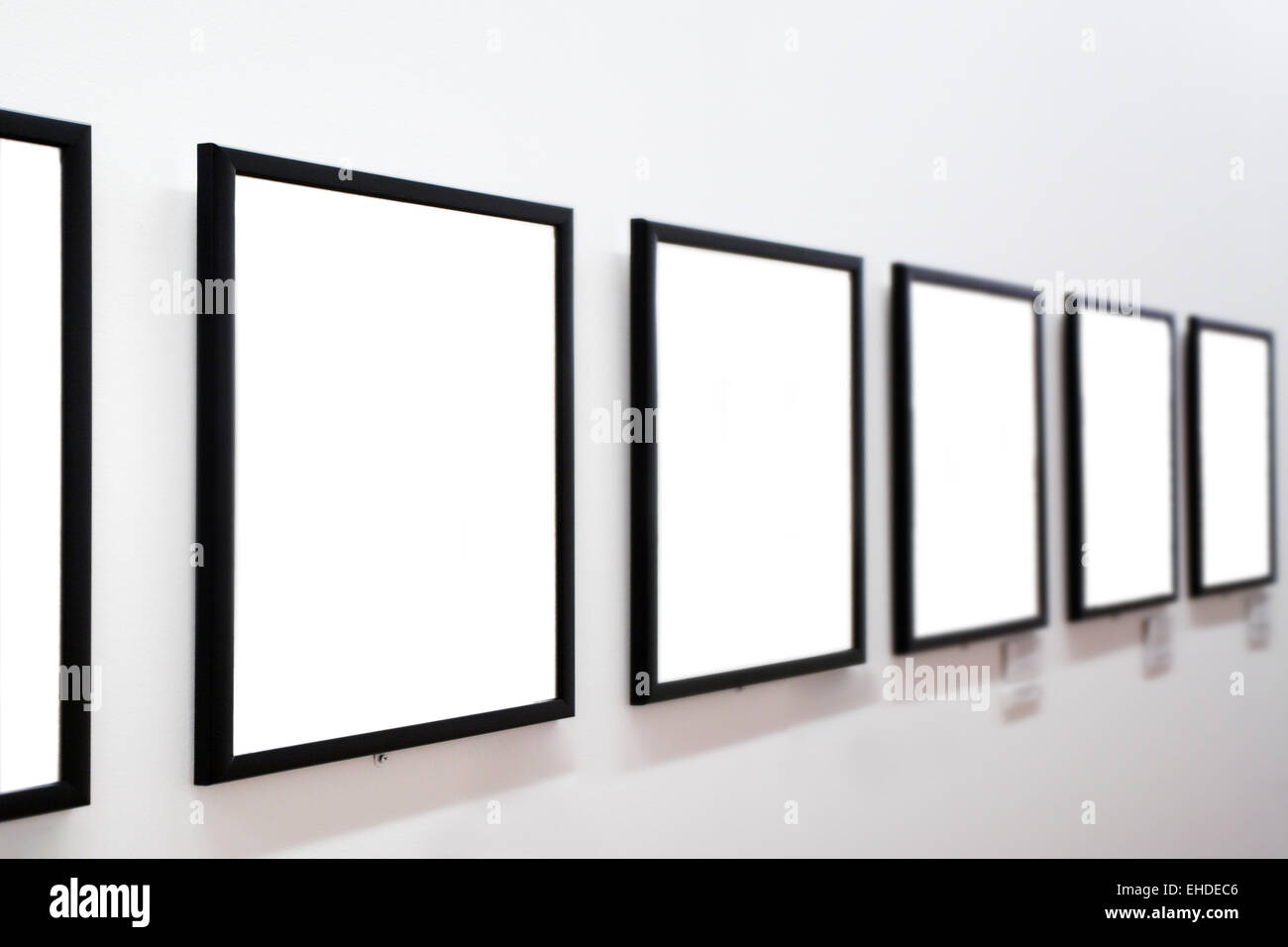empty frames on white wall in museum Stock Photo - Alamy