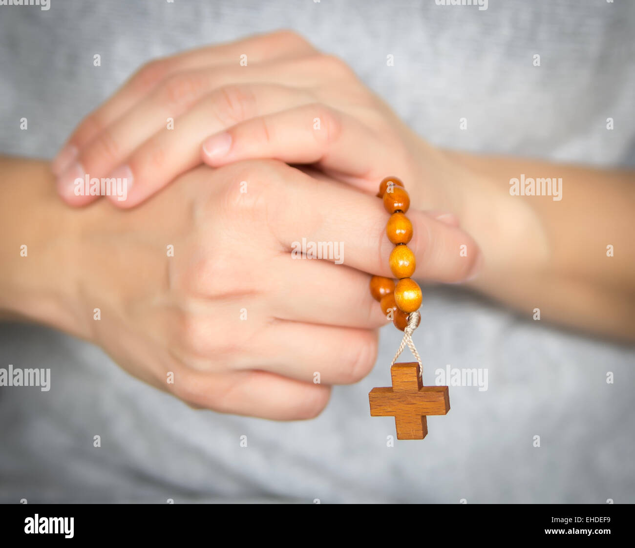 Prayer hands rosary hi-res stock photography and images - Alamy