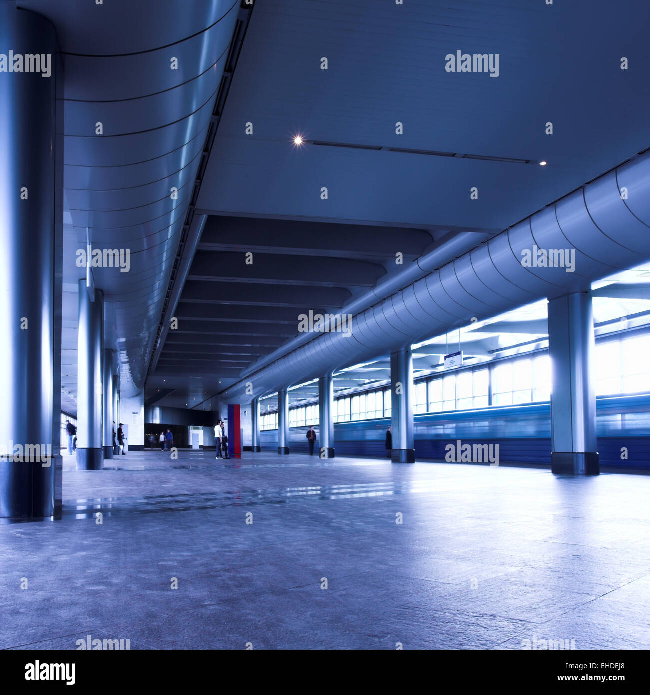 Blue train platform at subway Stock Photo - Alamy