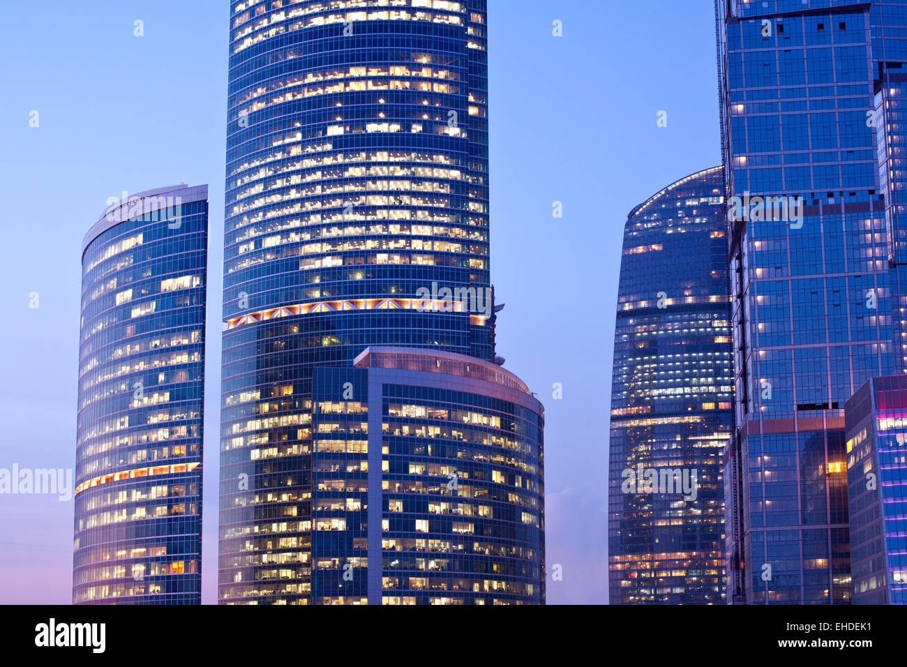 New skyscrapers at evening Stock Photo - Alamy