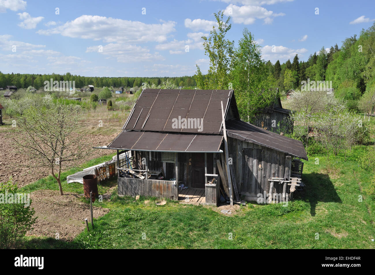 Country landscape with old wooden shack Stock Photo - Alamy