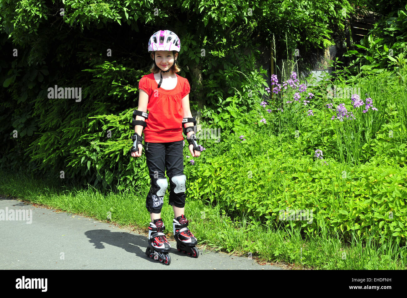 Inline Skating girl Stock Photo - Alamy