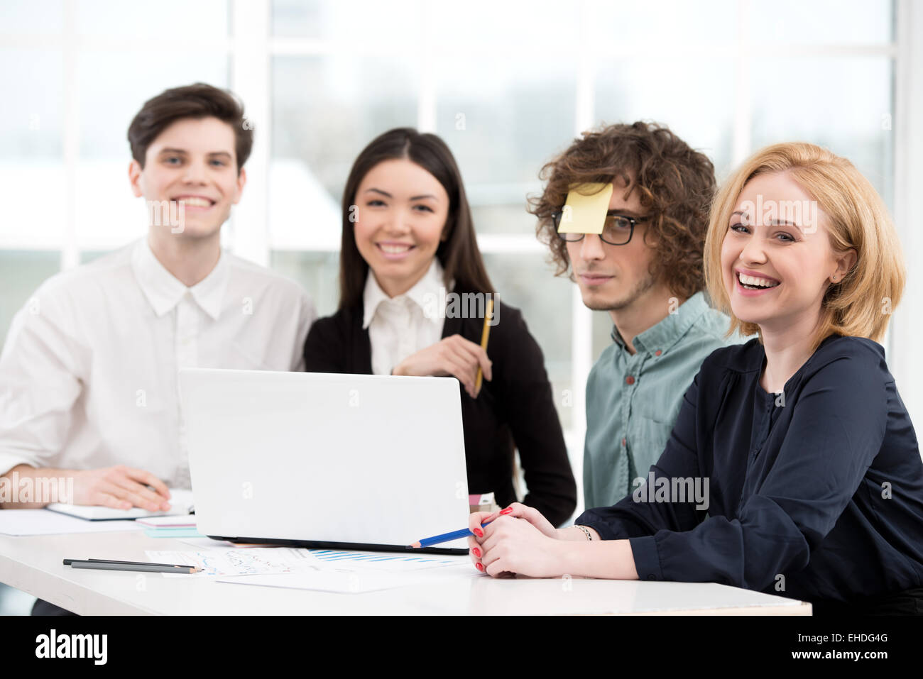 Team working at laptop hi-res stock photography and images - Alamy