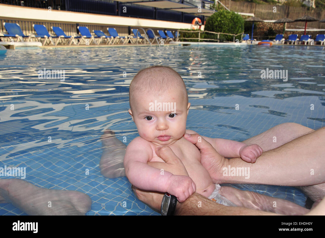 Baby in swimming pool Stock Photo - Alamy