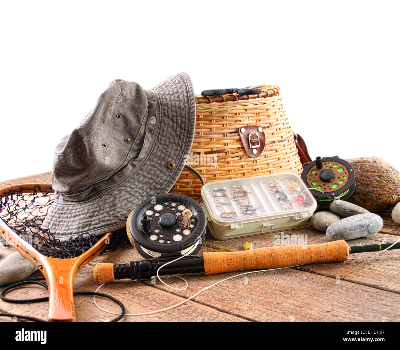 Fly fishing equipment on white Stock Photo - Alamy