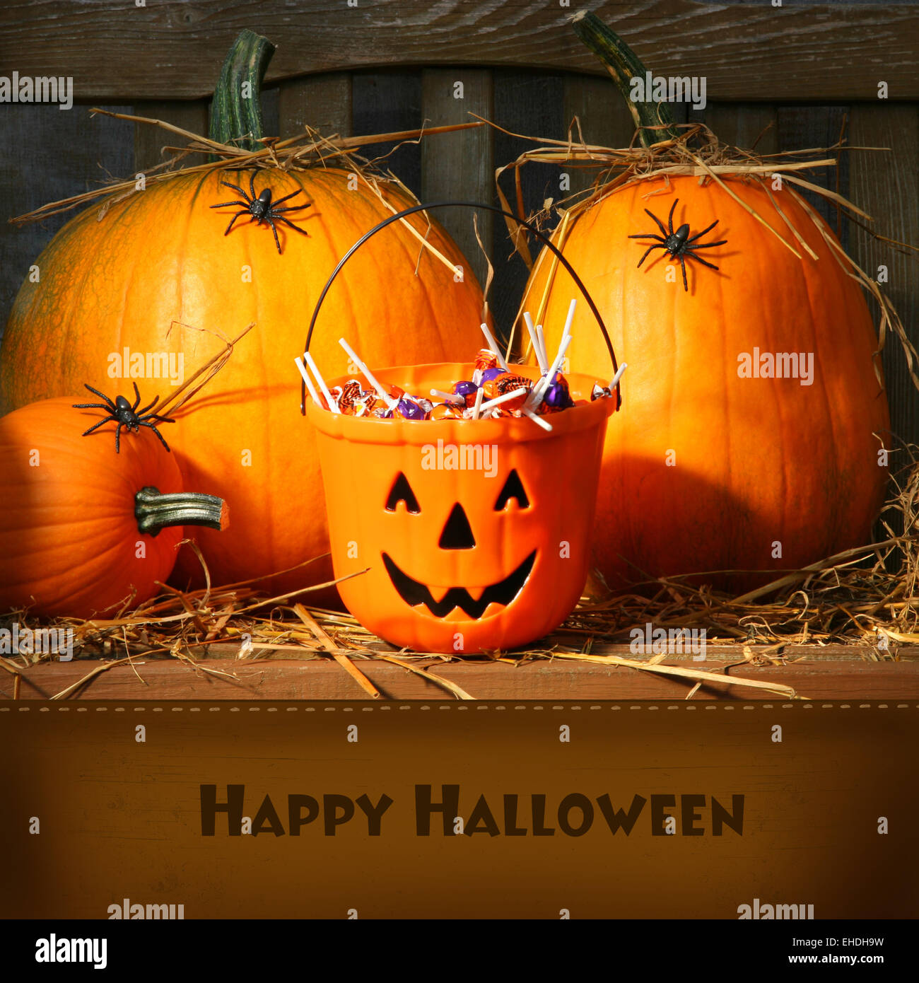 Bucket filled with halloween candy Stock Photo - Alamy
