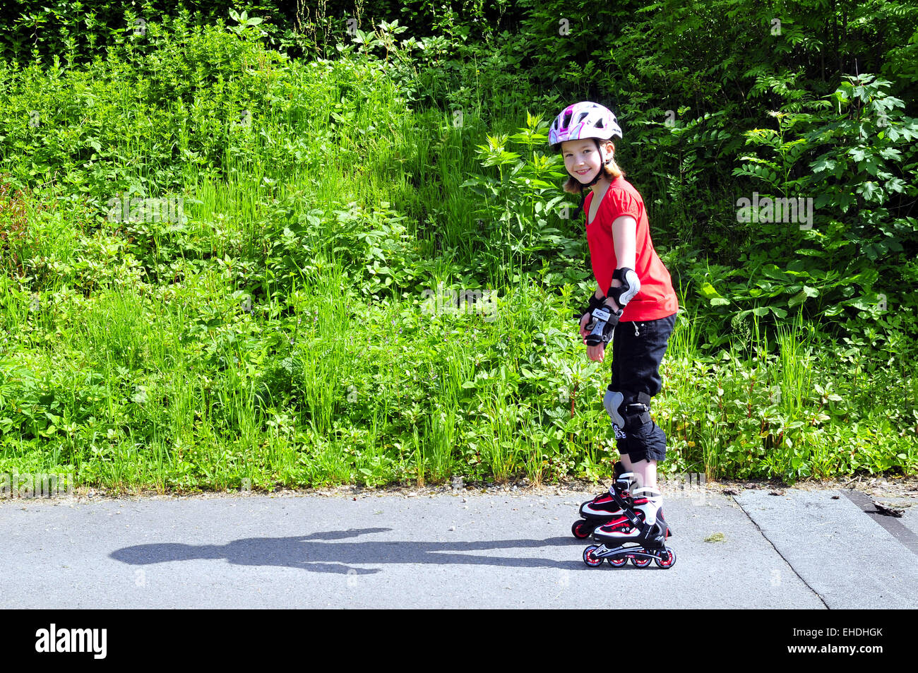 Inline skating child hi-res stock photography and images - Alamy