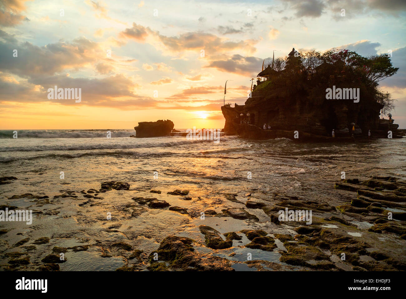 Sunset at tanah Lot temple Stock Photo - Alamy