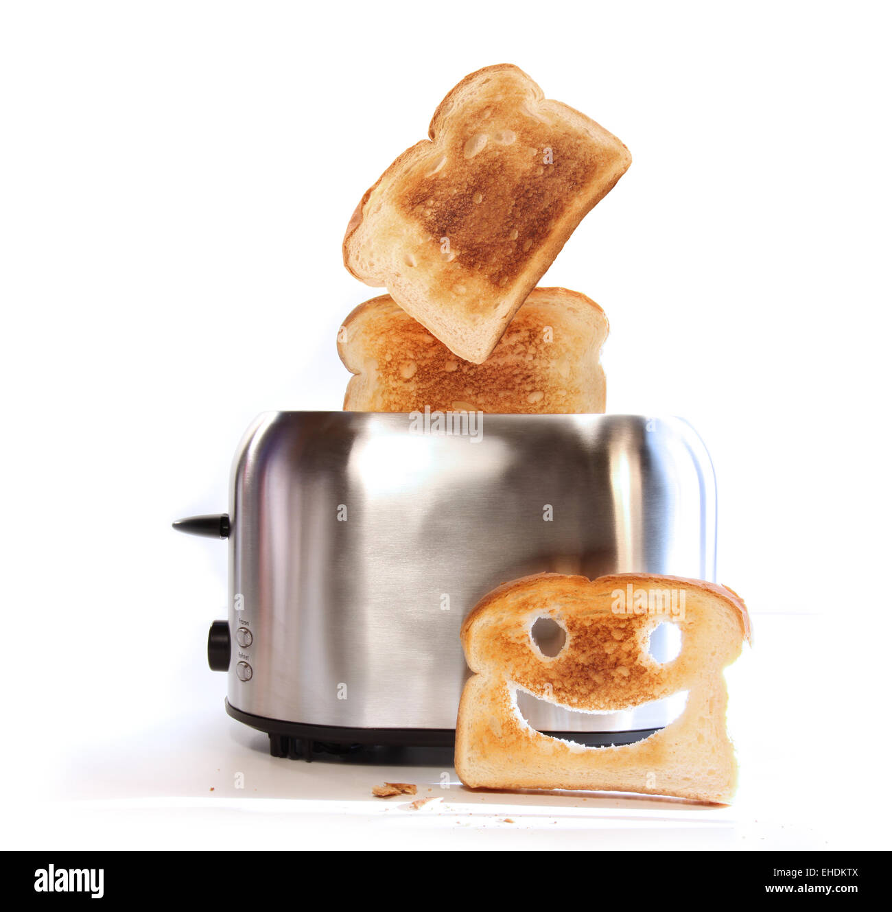 Toaster with slices of toast Stock Photo - Alamy