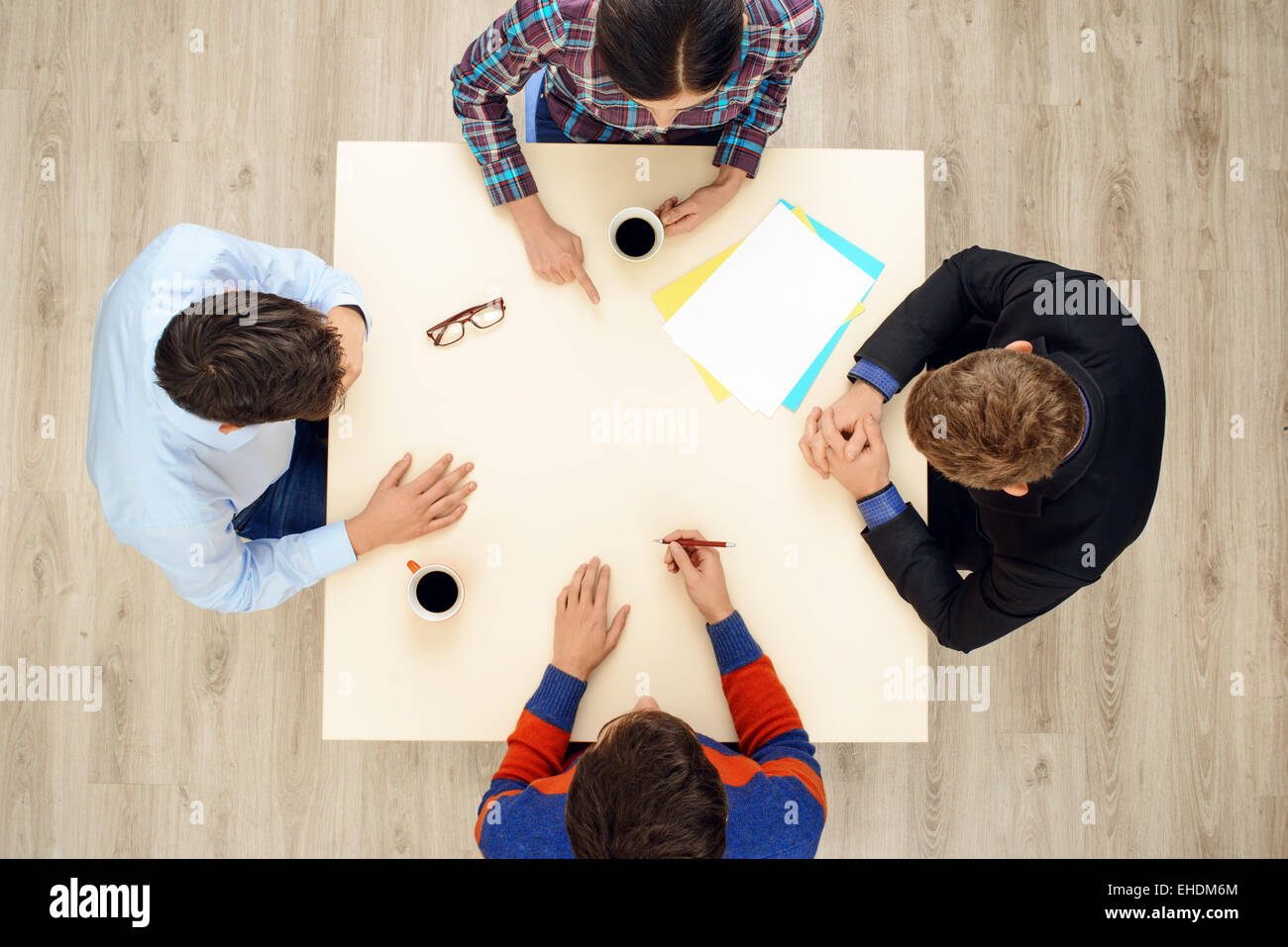 Top view table with group of creative people Stock Photo - Alamy