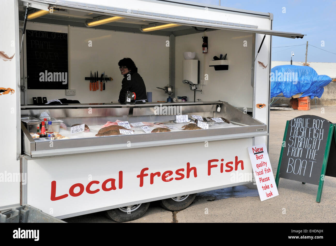 fishmongers stall at whitstable harbour kent Stock Photo - Alamy