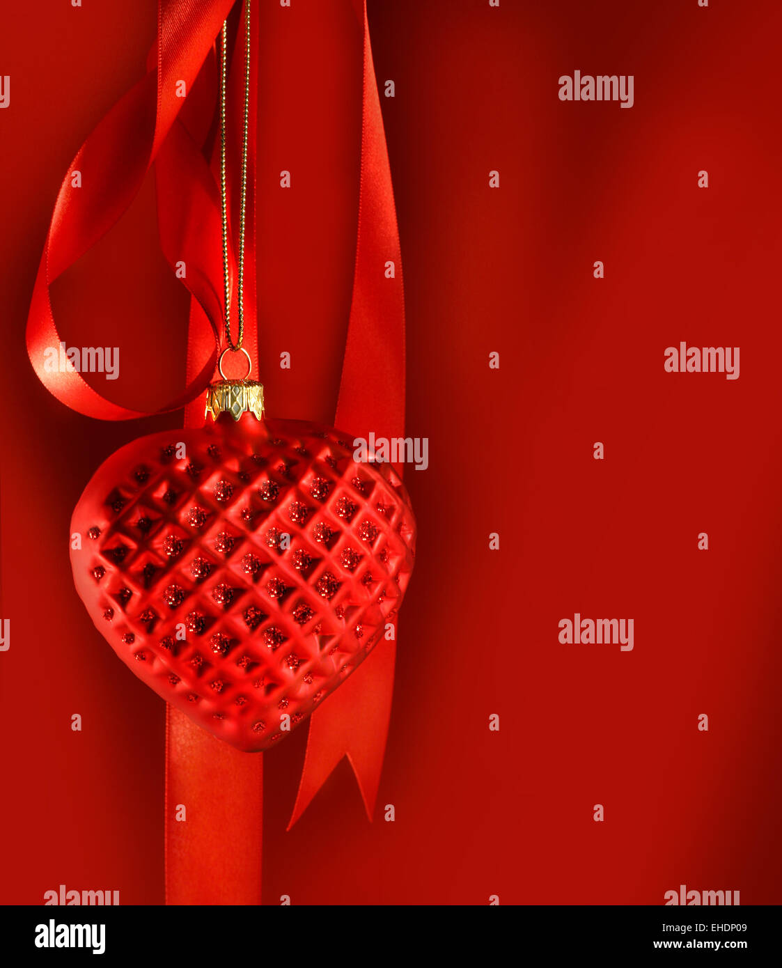 Red heart hanging with ribbon Stock Photo - Alamy