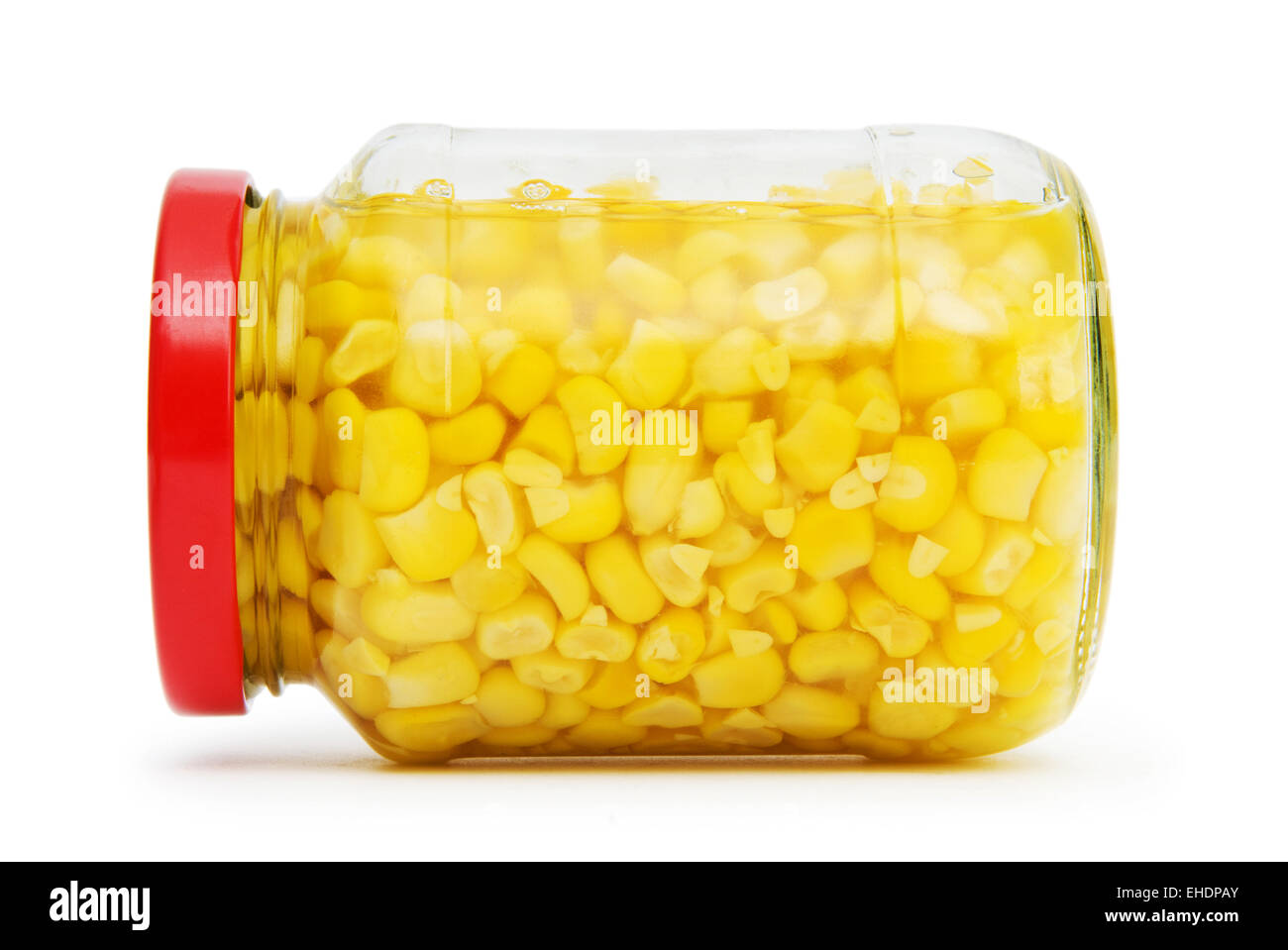 Sweet corn in glass jar isolated on white Stock Photo - Alamy