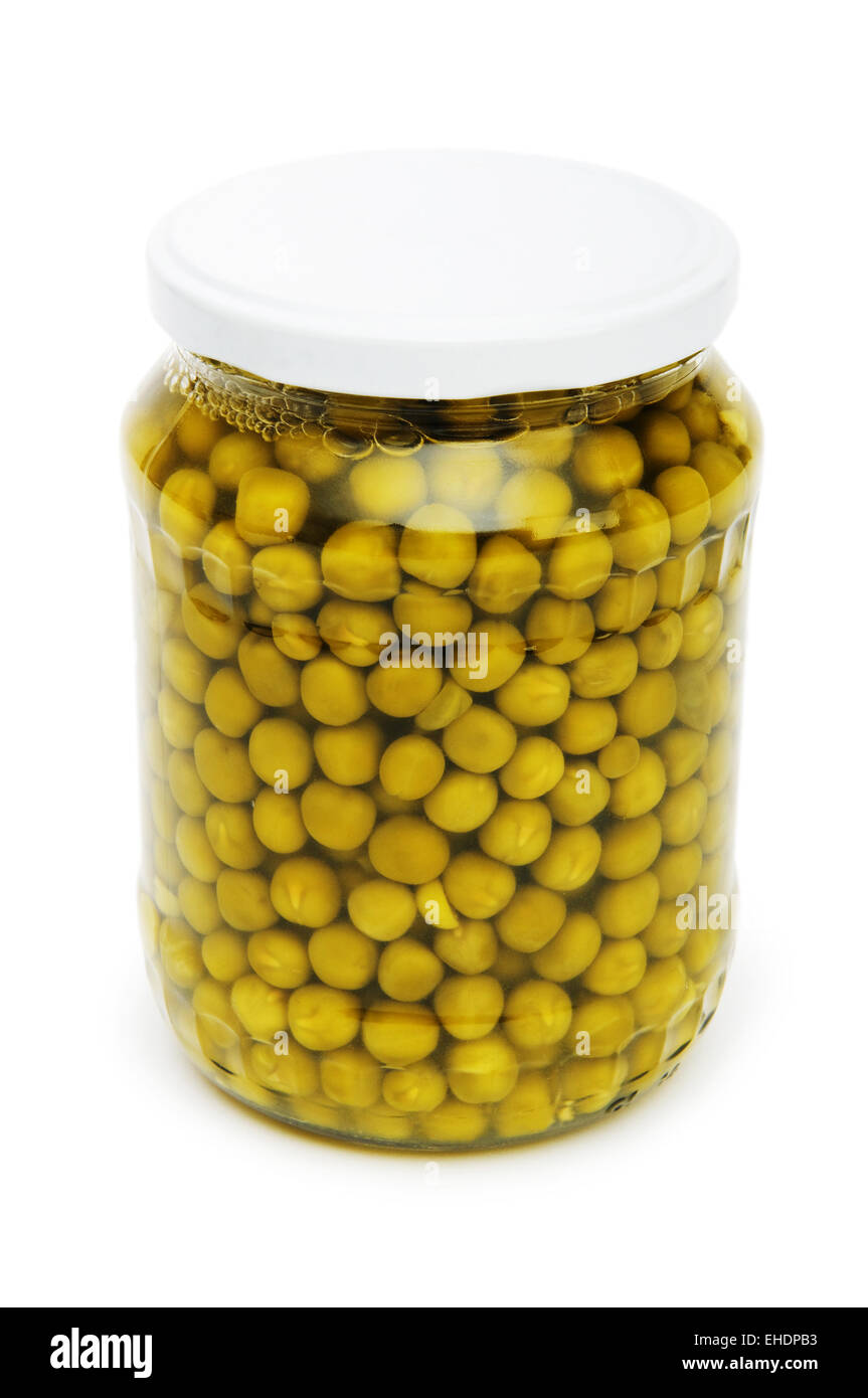 Green peas in glass jar isolated on white Stock Photo - Alamy