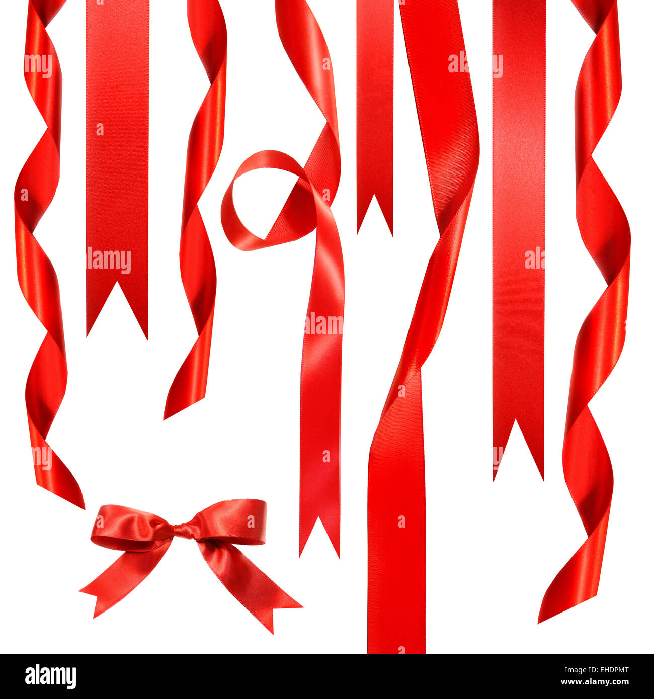 Red ribbons hanging down on white Stock Photo - Alamy