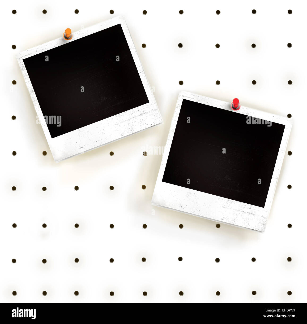 White peg board with photo frames Stock Photo - Alamy