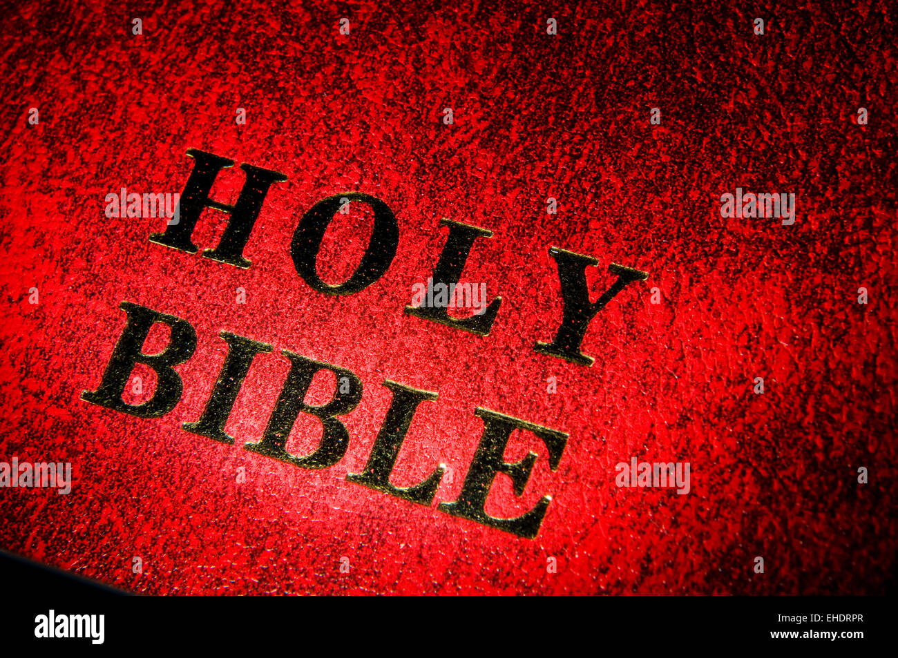 Red leather cover of the Bible book Stock Photo - Alamy