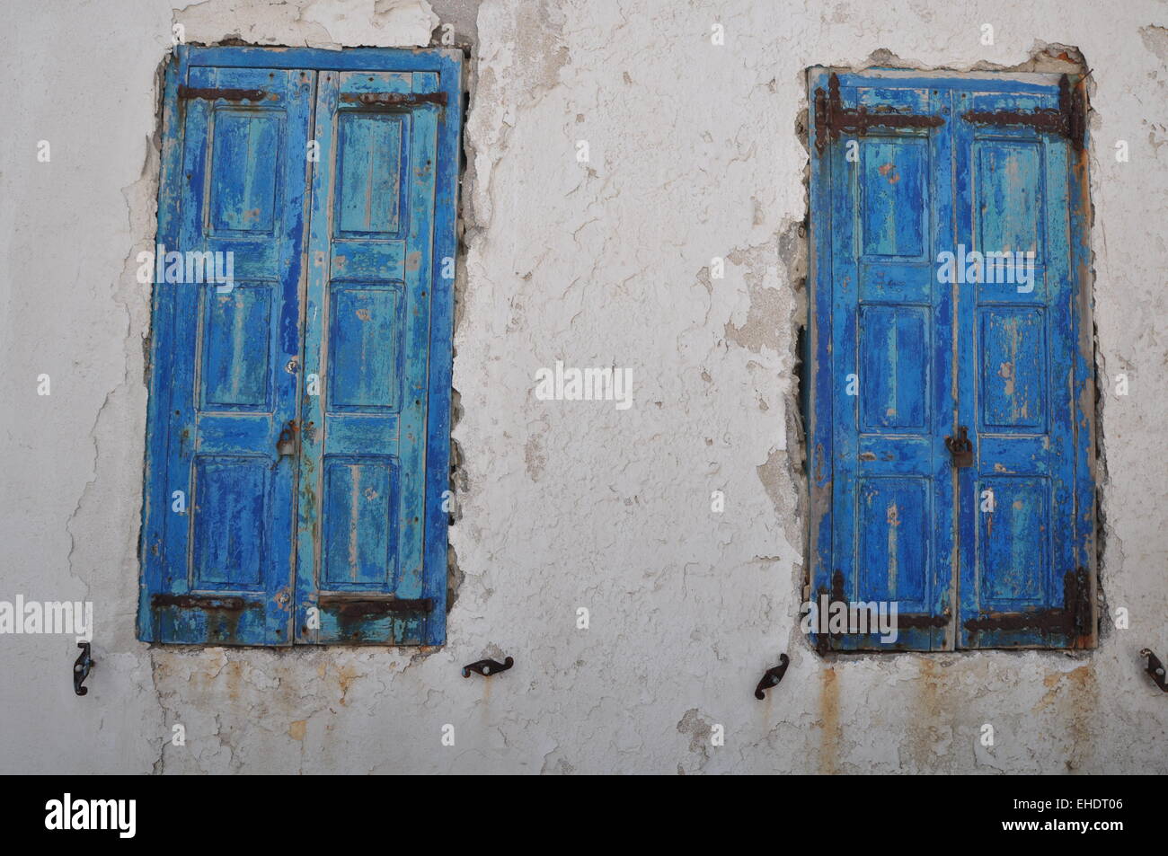 Blue window shutters, Mykonos, Greece Stock Photo - Alamy
