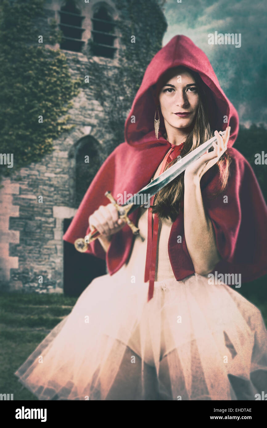 Woman holding dagger hi-res stock photography and images - Alamy