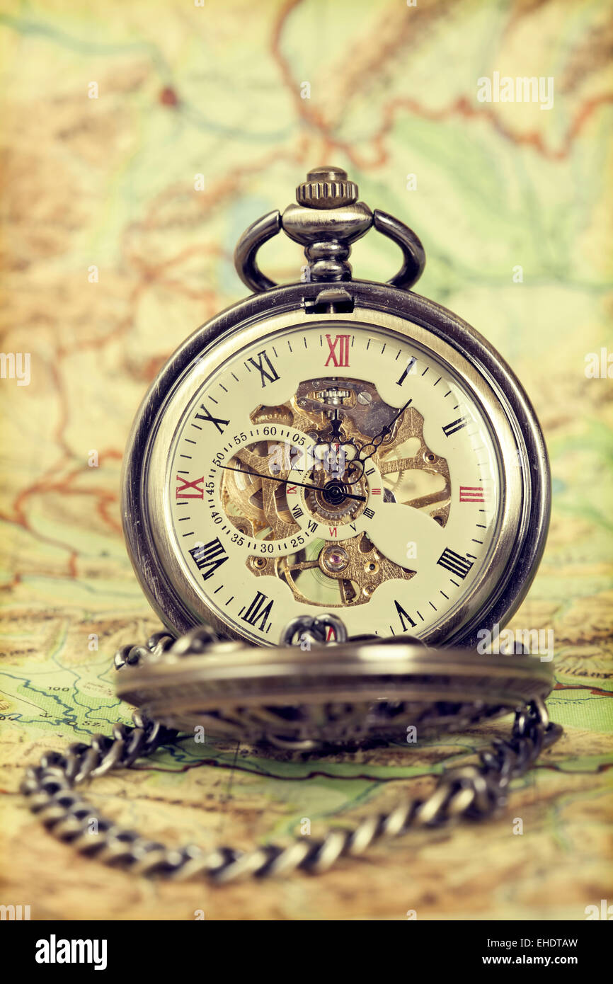 Vintage watch on antique map. Retro still life Stock Photo - Alamy
