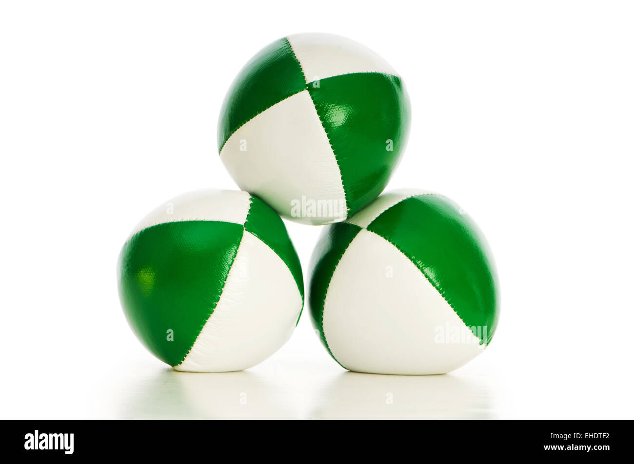 Green stress balls isolated on the white Stock Photo - Alamy