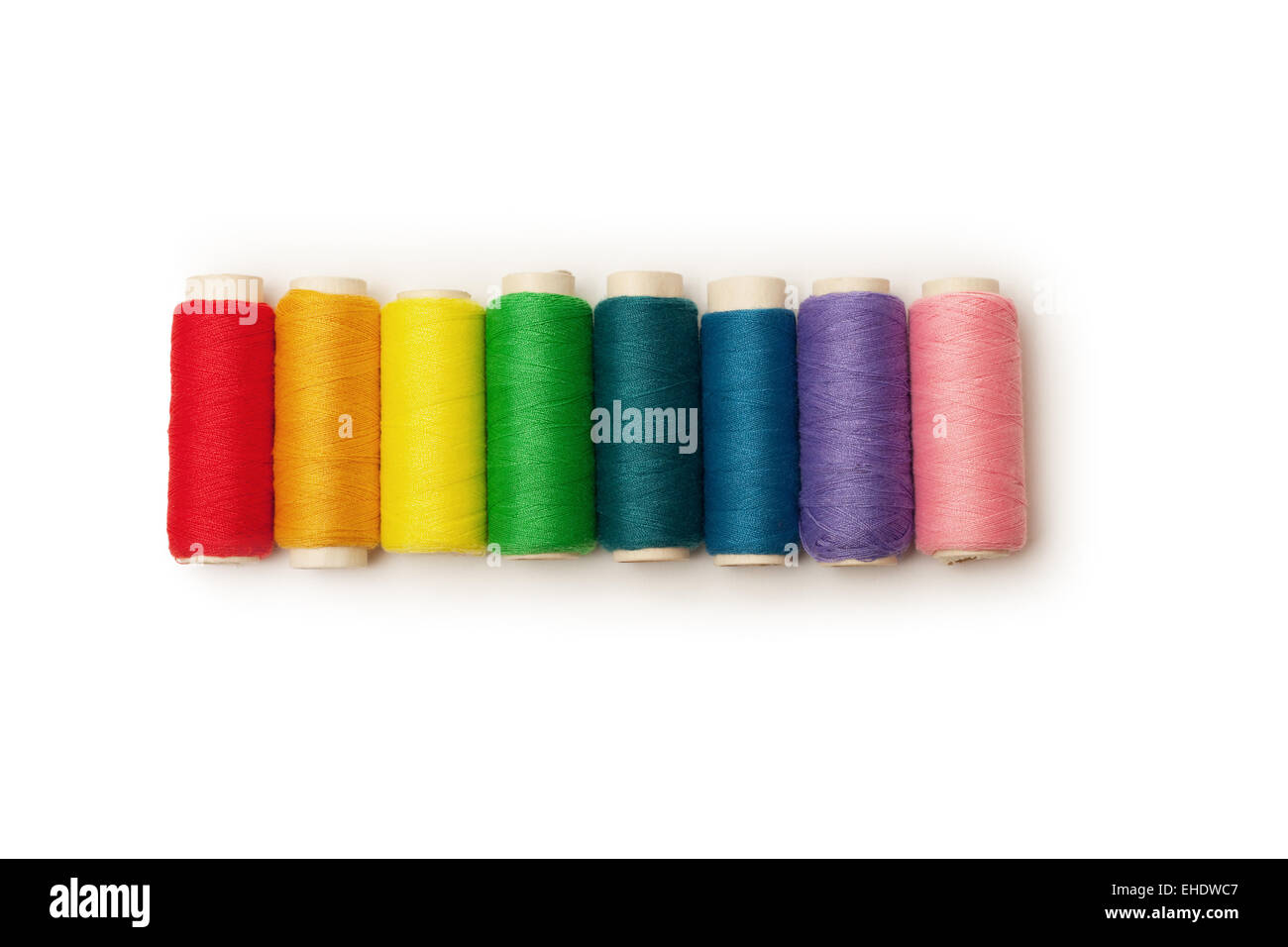 rainbow colored set of threads Stock Photo - Alamy