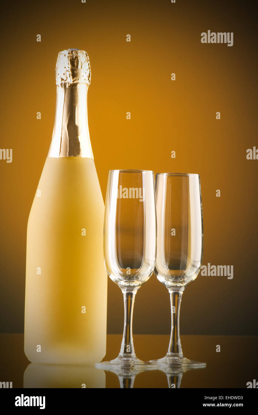 Champagne against color gradient background Stock Photo - Alamy