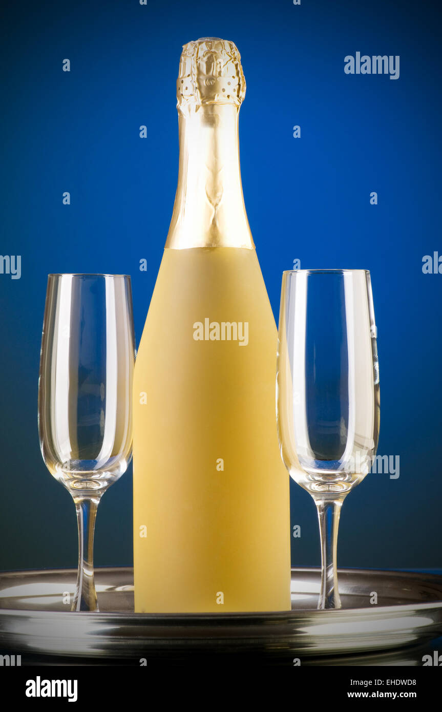 Champagne against color gradient background Stock Photo - Alamy