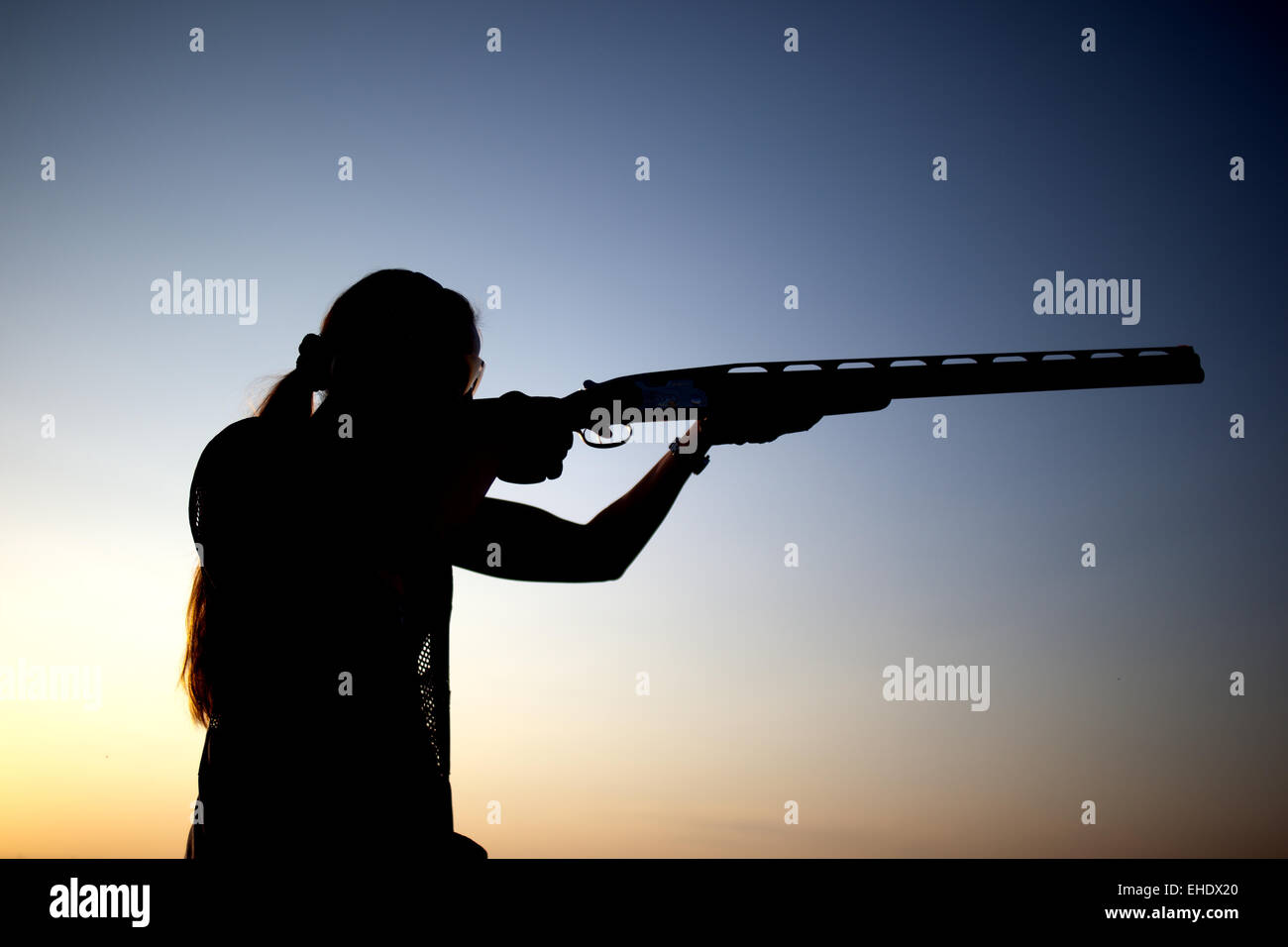 Silhouette shooting person with gun hi-res stock photography and images ...