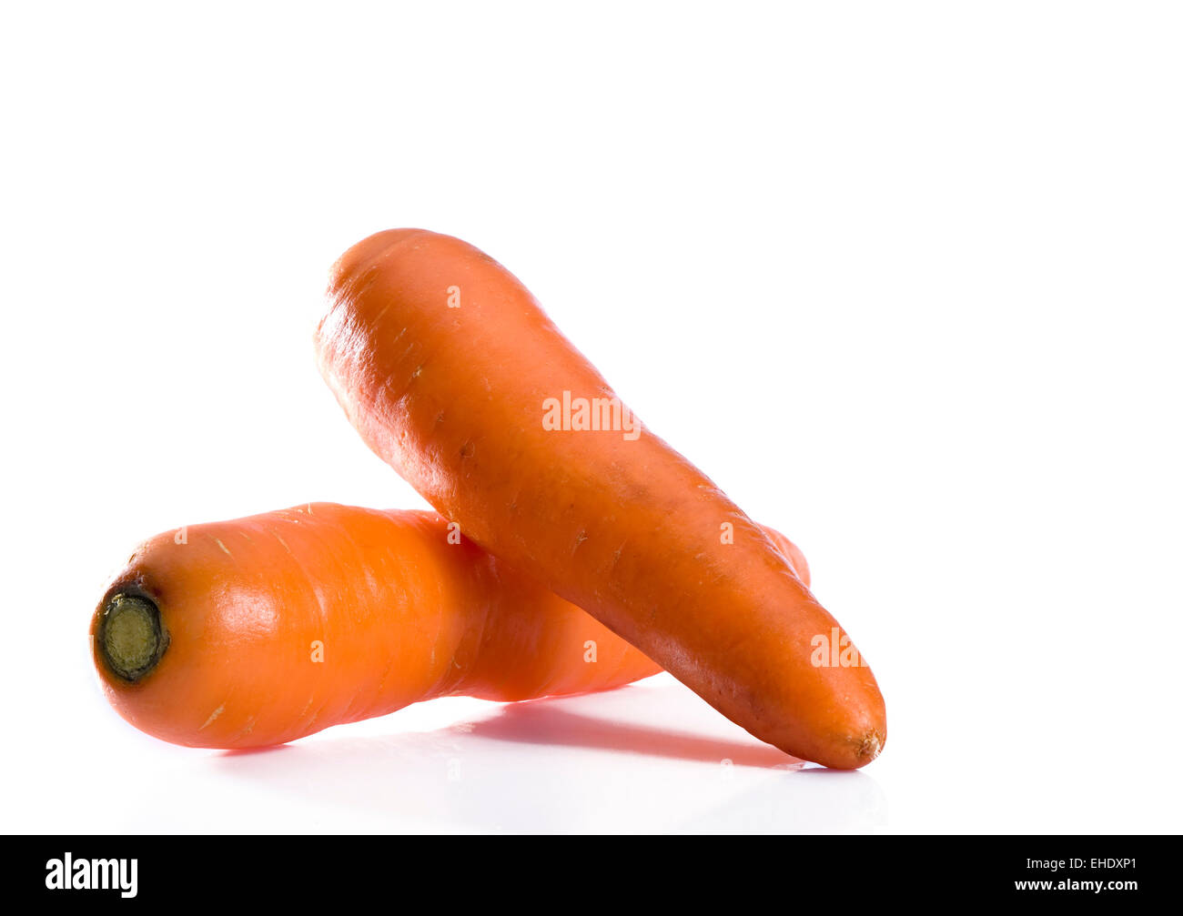 Close up view of nice fresh carrot on white back Stock Photo - Alamy