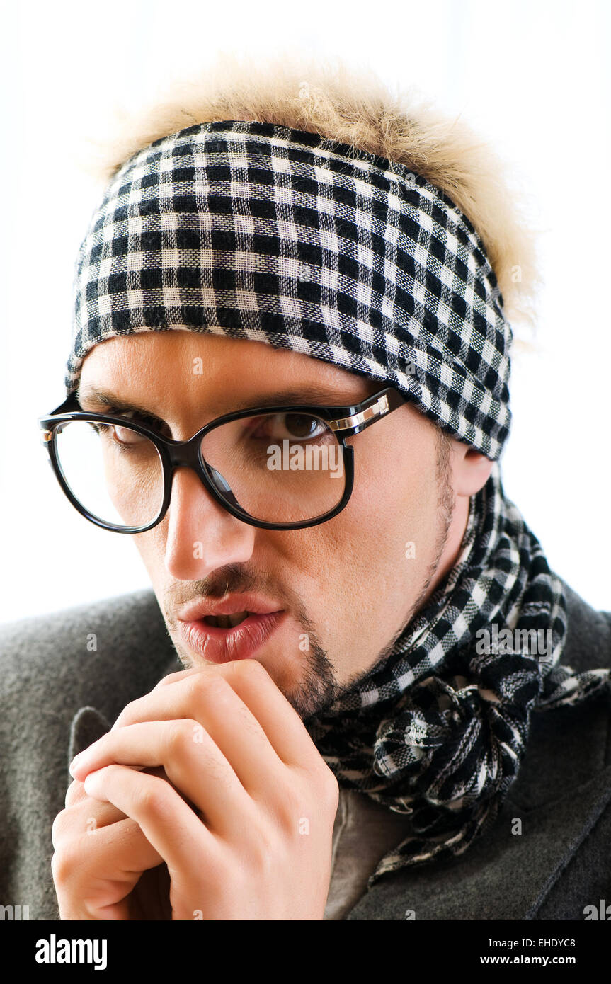 Man with glasses in studio shooting Stock Photo - Alamy