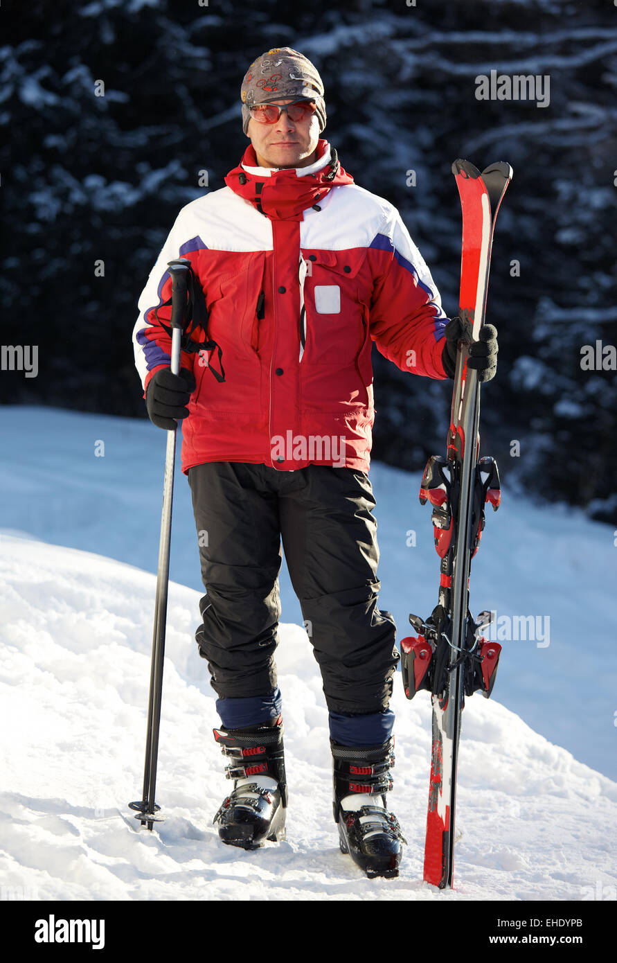 Skier portrait and snowfall Stock Photo - Alamy