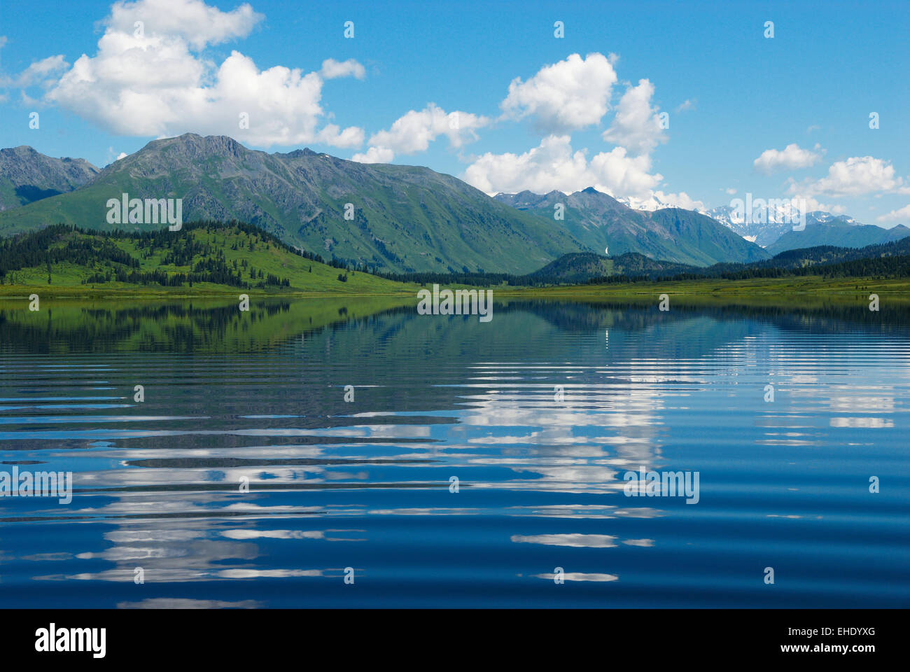 Reflection on wave in lake Stock Photo - Alamy
