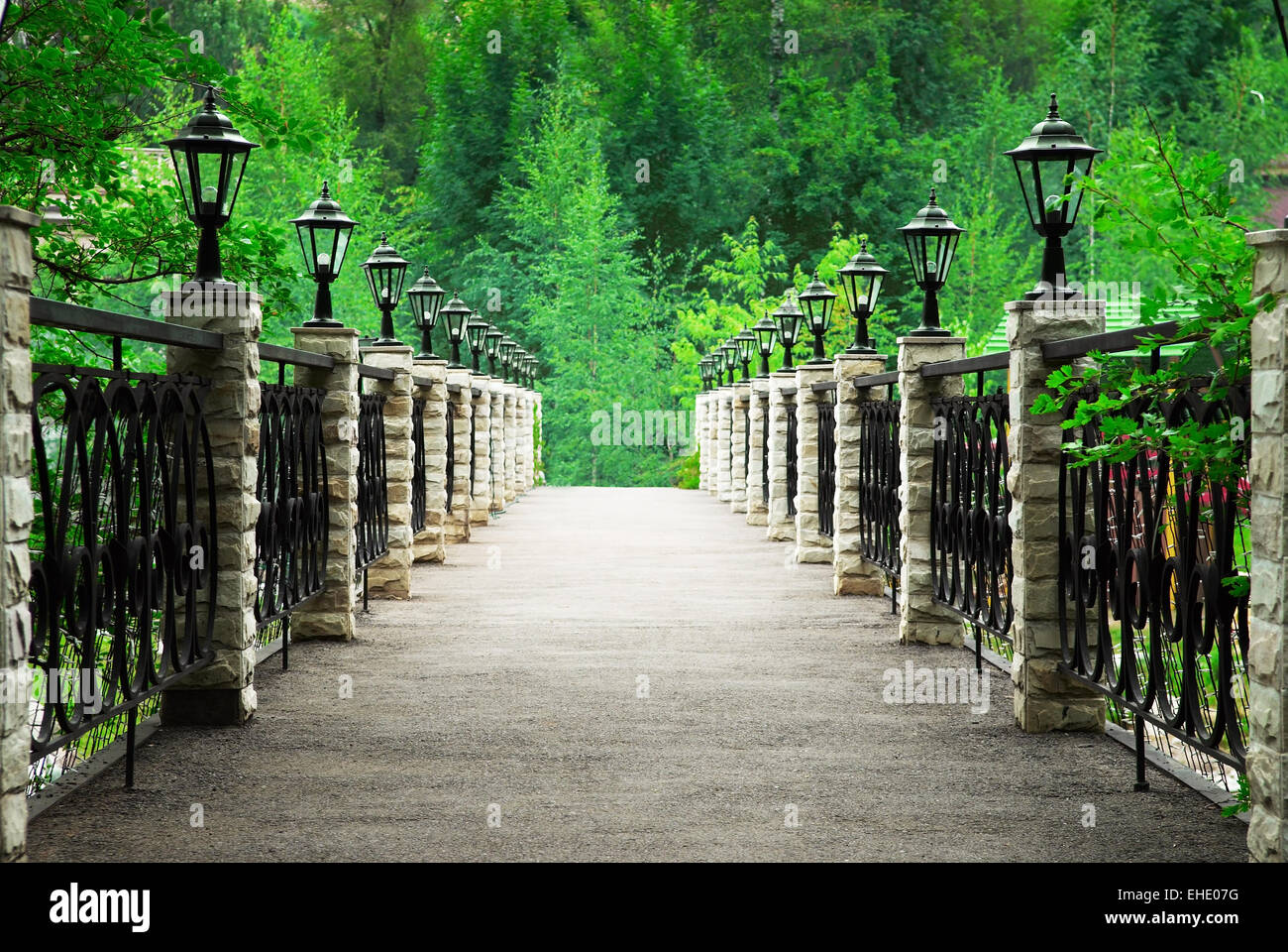 Footbridge in park Stock Photo - Alamy