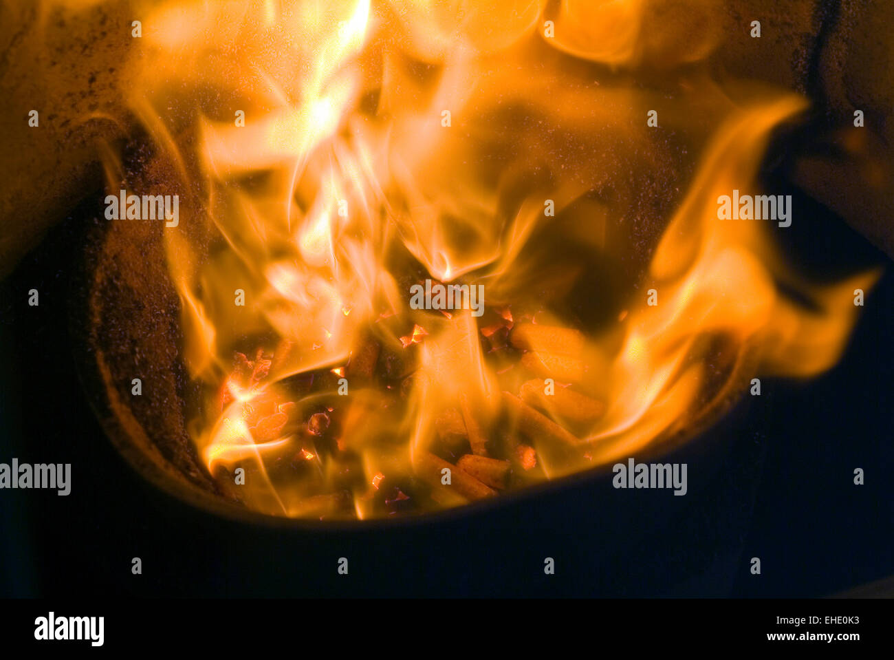 Heat flame of a pellet heating Stock Photo - Alamy