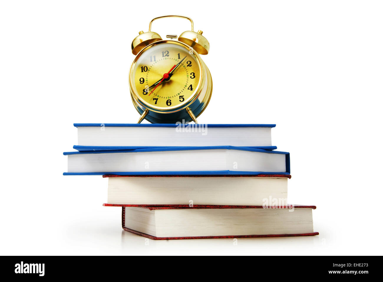 Back to school concept with books and clock Stock Photo - Alamy