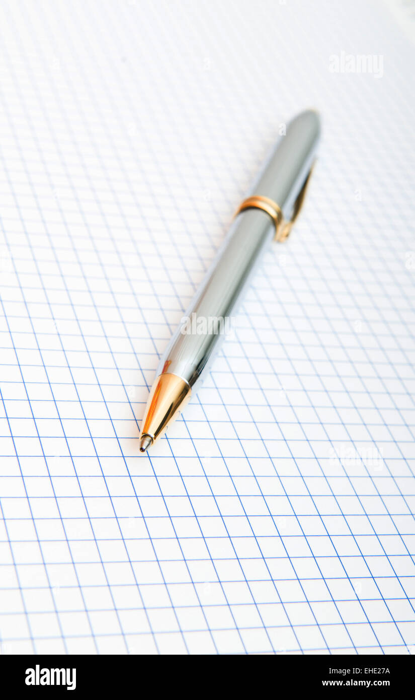 Writing pen on the blank page Stock Photo - Alamy